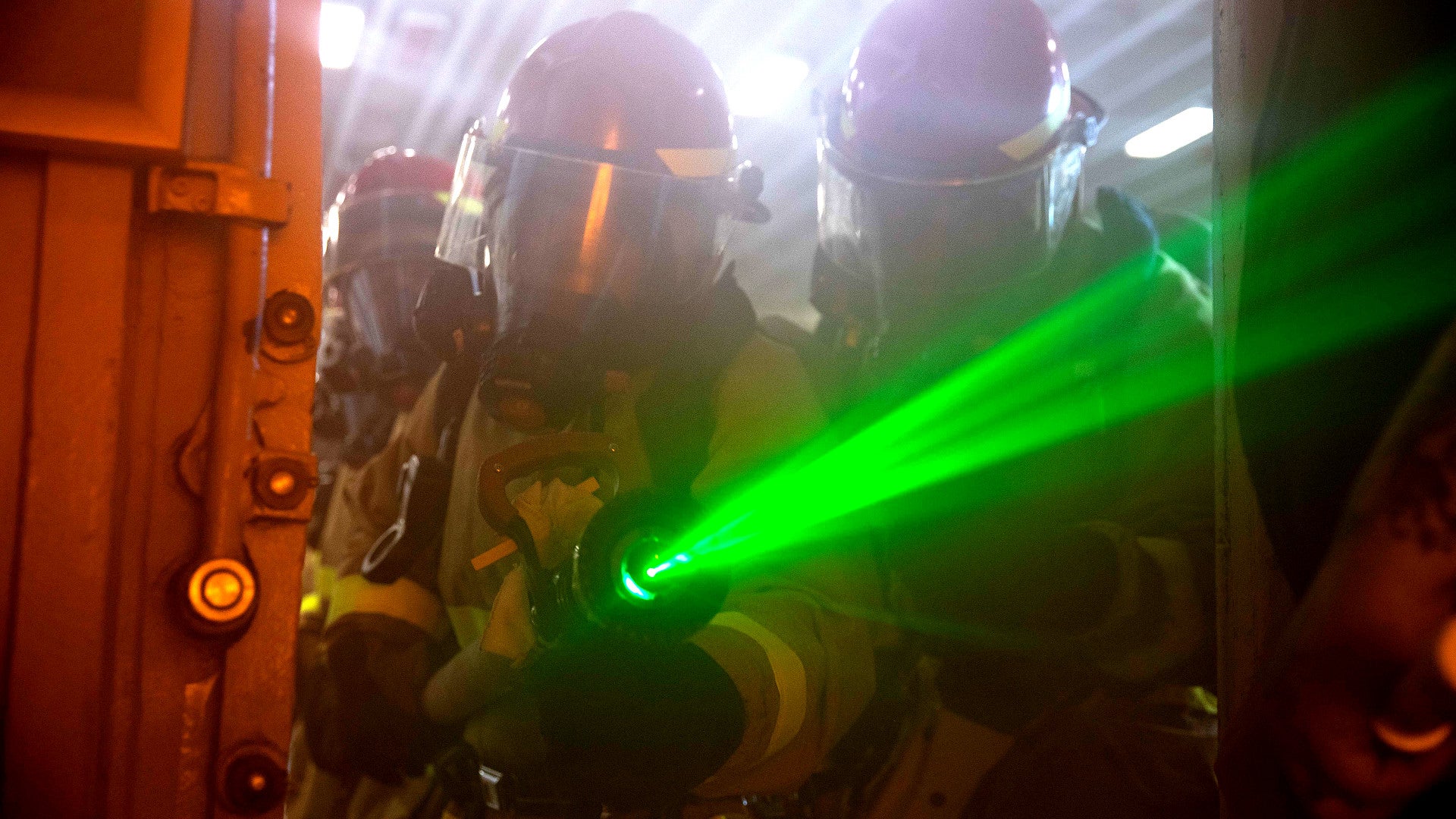 Here Is Why This Sailor Is Holding A Laser Fire Hose | The War Zone