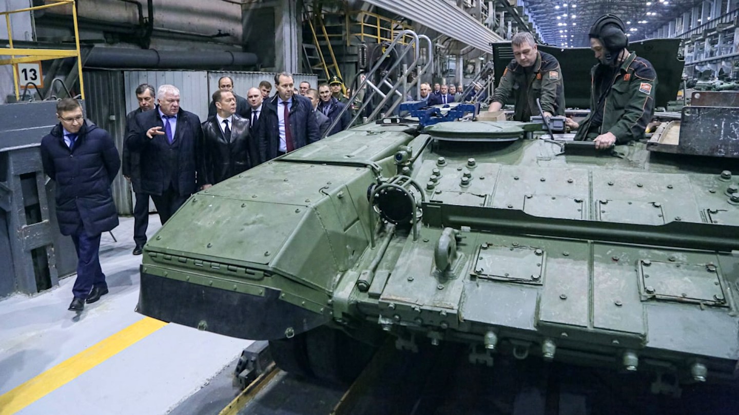 Russia's Medvedev Threatens Defense Industry Arrests During Tank Plant ...