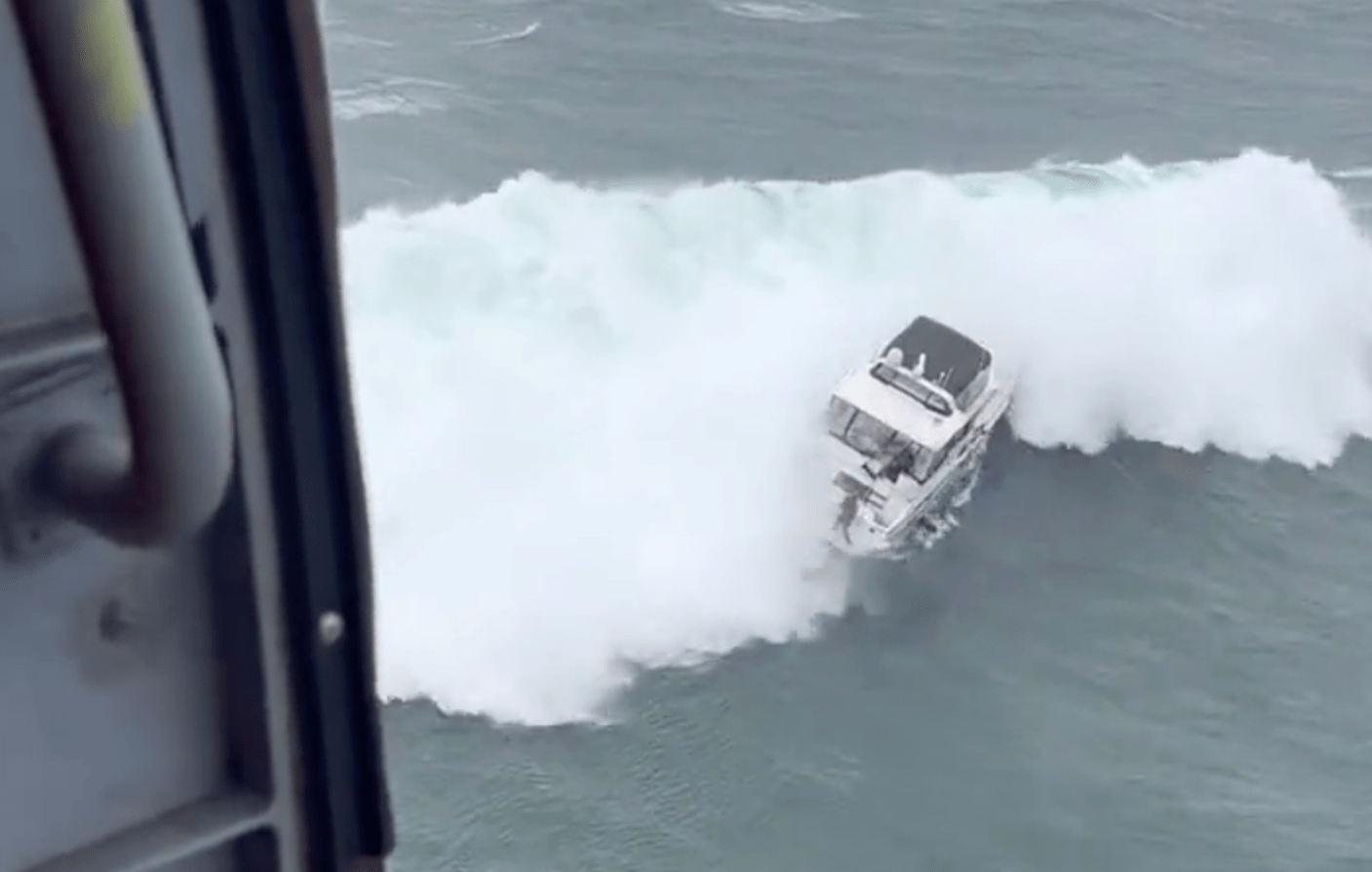 Coast Guard Rescue Swimmer Makes Incredible Save After Huge Wave (Updated)