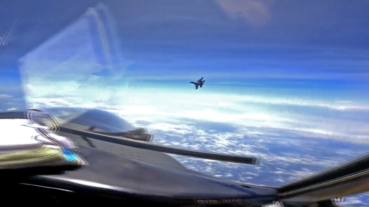 Chinese J-16 Seen 'Head Butting' U.S. RC-135 In Cockpit Video