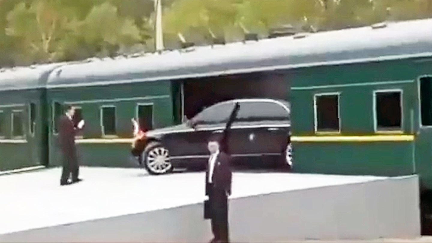Kim Jong Un's Maybach Limo Seen Squeezing Into His Armored Train