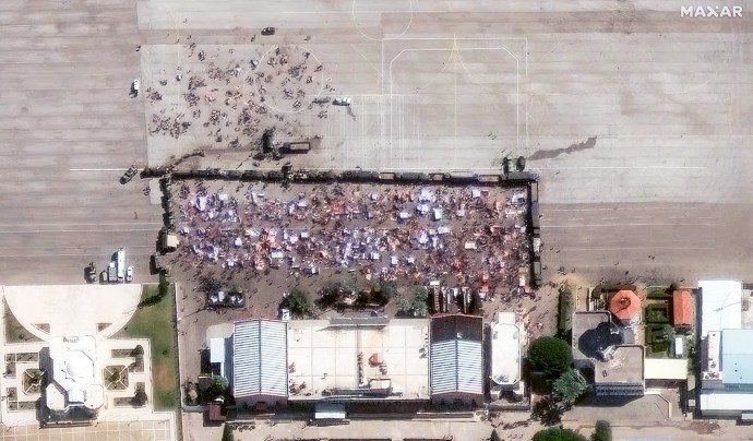 Russia's Air Base In Syria Has Become Refuge From Fierce Sectarian Violence