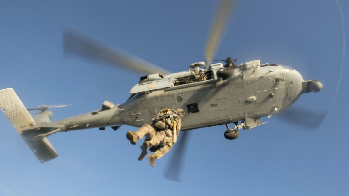 Check Out This Eerie Image Of A Navy Special Ops Seahawk Raiding A Ship ...
