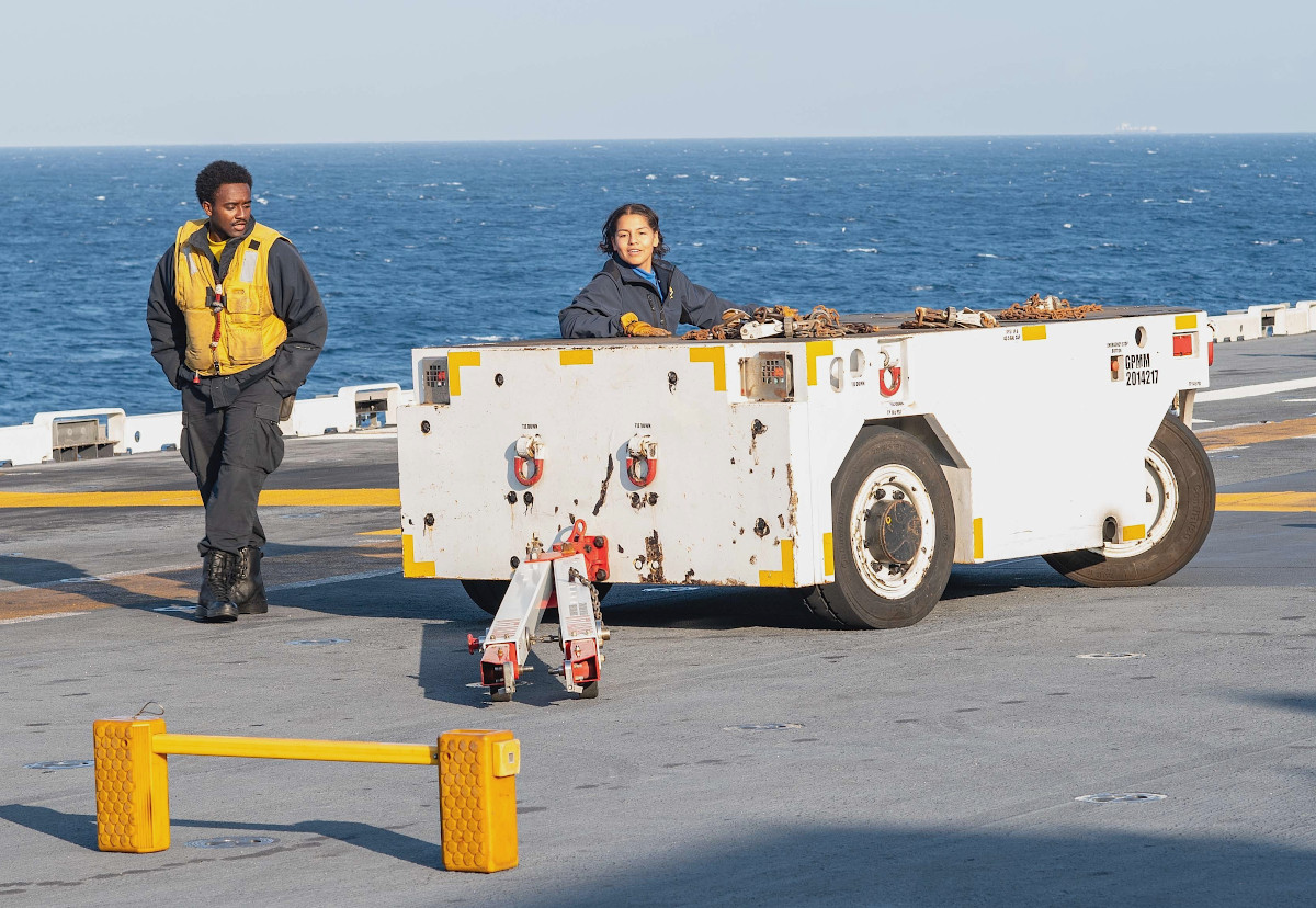 USS America Keeps Captain America Theme Going With Custom Painted Tractor