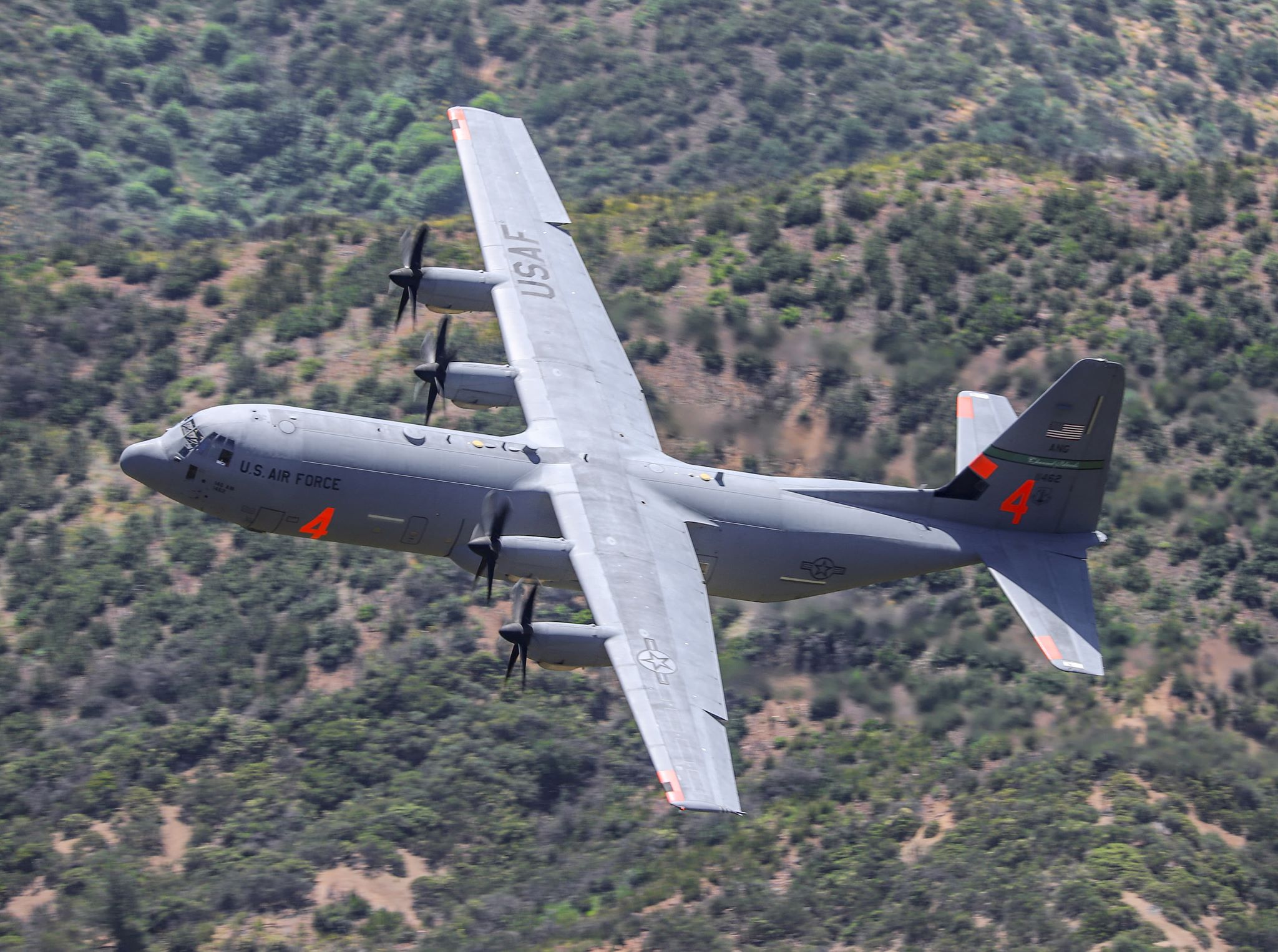 Photographer Catches Formation Of C-130 Transports Flying Through A ...